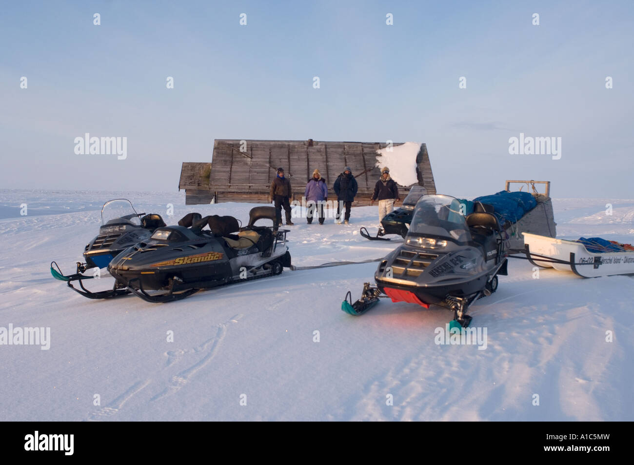 Inupiat friends and photographer outside an old trading post just ...