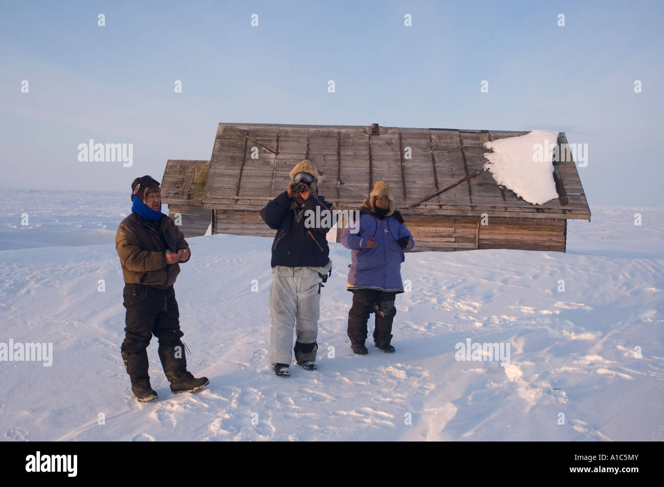 Inupiat friends outside an old trading post just inside the US border ...