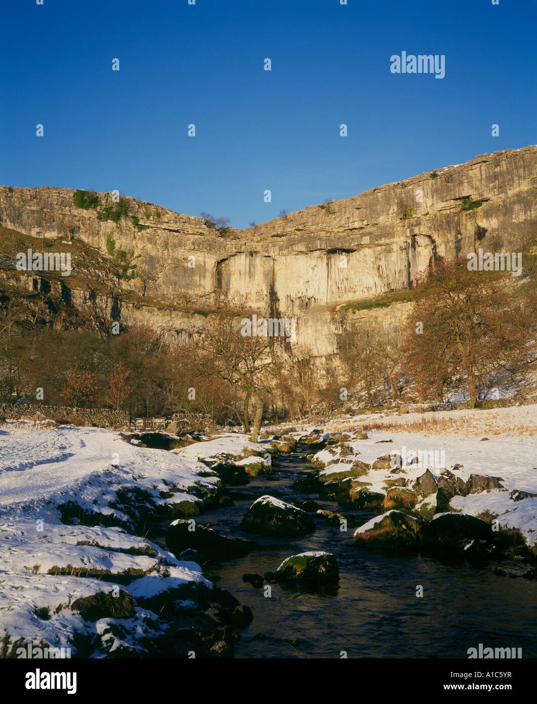 malham beck flowing through malham cove in wintertime malham yorkshire ...
