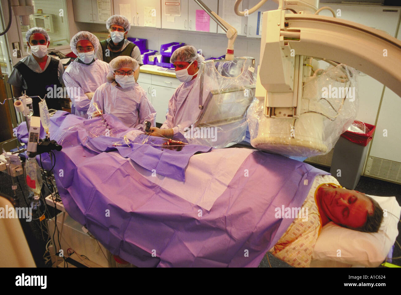 Dr Fayaz A Shawl interventional cardiologist inflates balloon with ...