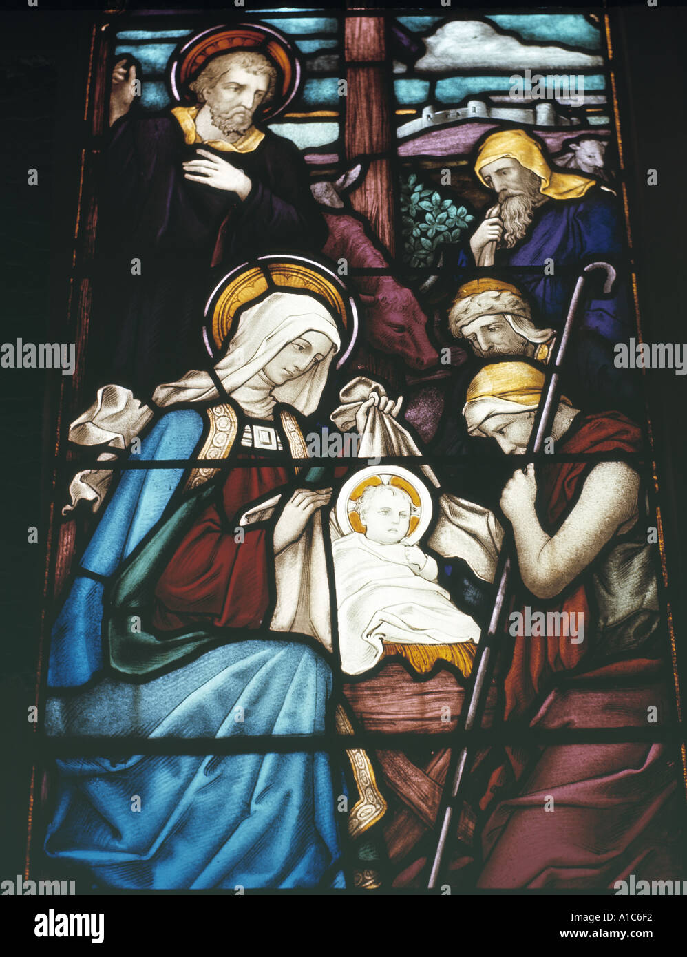 Stained glass window depicting the Nativity scene with the Holy Family ...