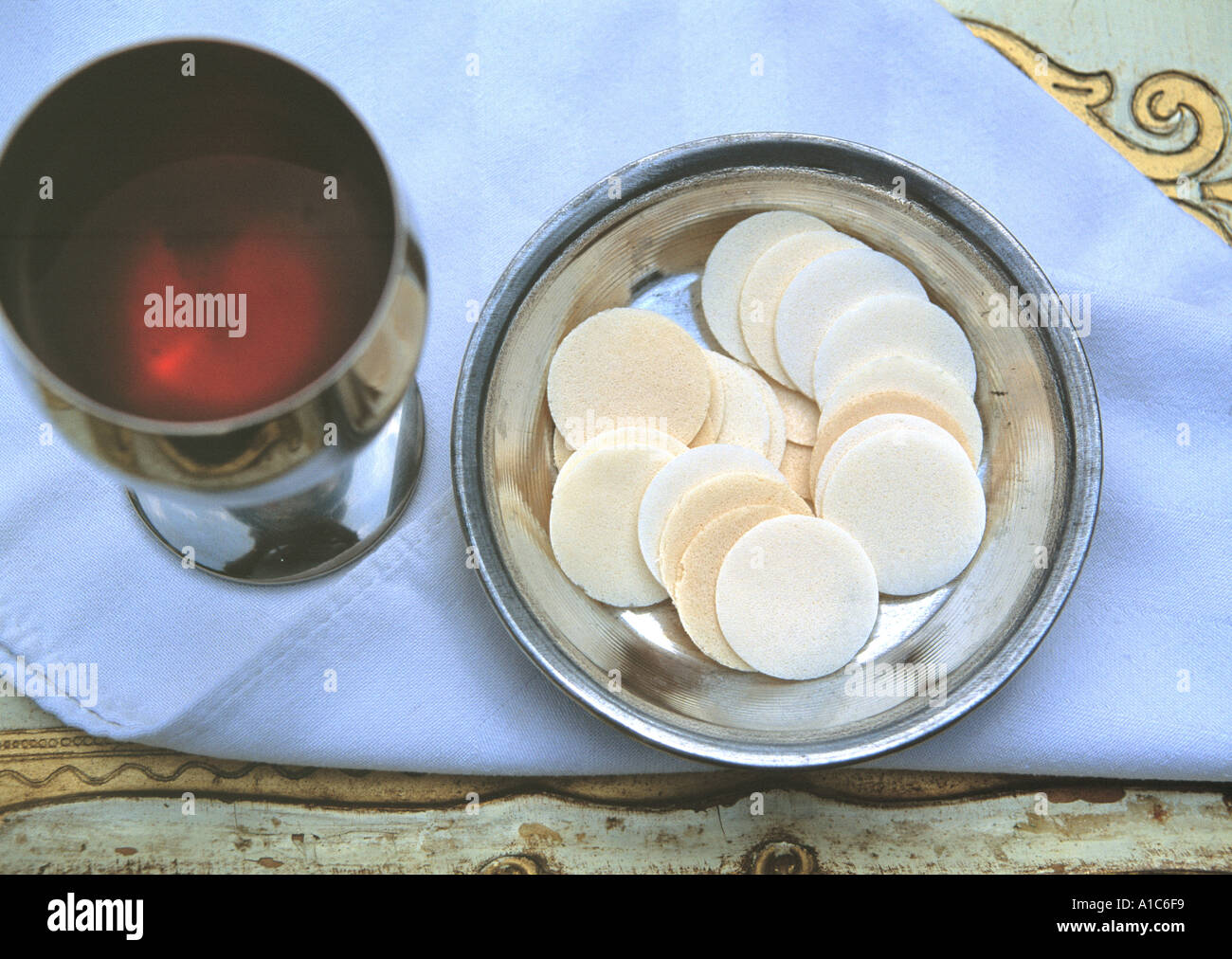 The holy sacraments of bread and wine partaken by the congregation at ...