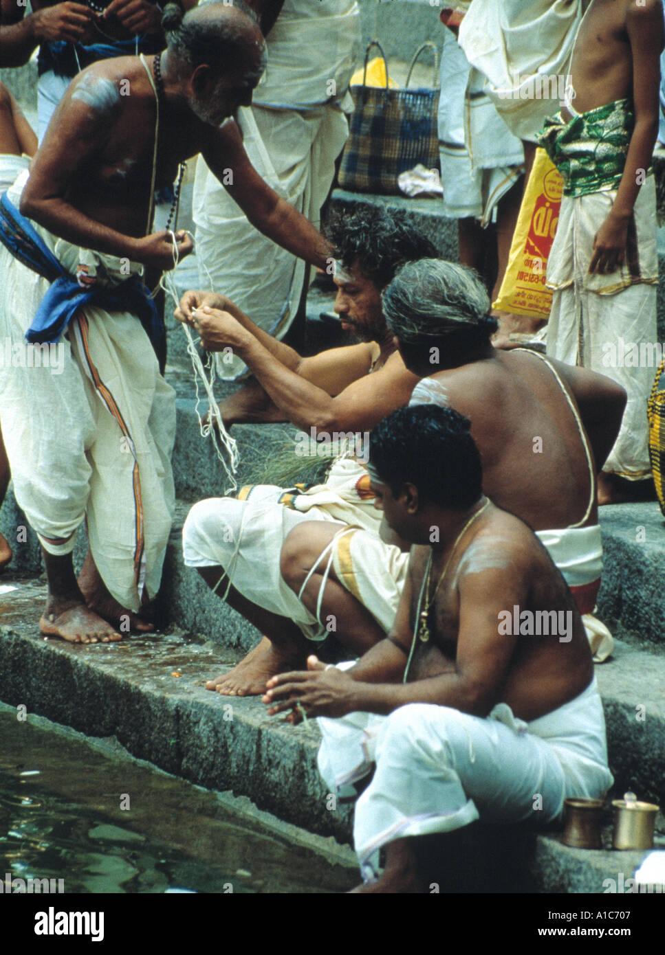 Brahmin priests perform Jandhya dharana the changing of the sacred ...