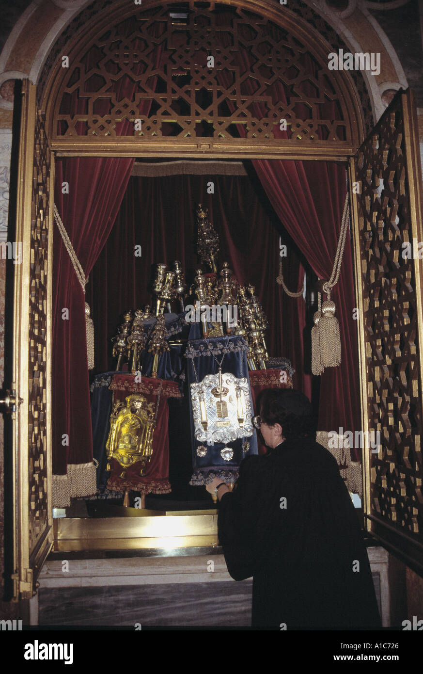 A woman rabbi opening the ark in a synagogue in West London Stock Photo ...