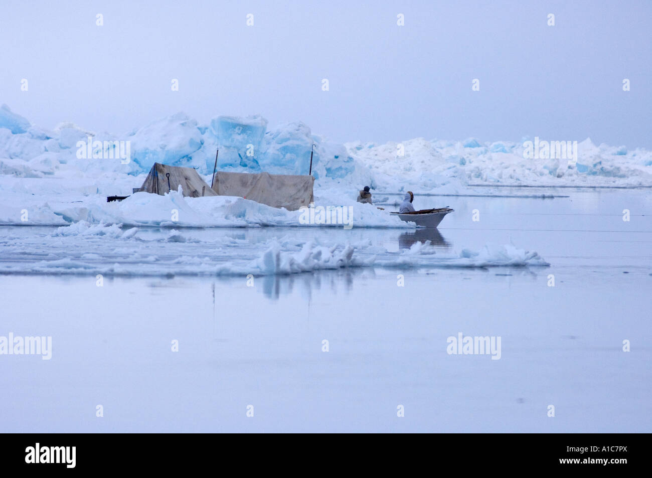 Savik whaling crew camp at the edge of an open lead on the frozen ...