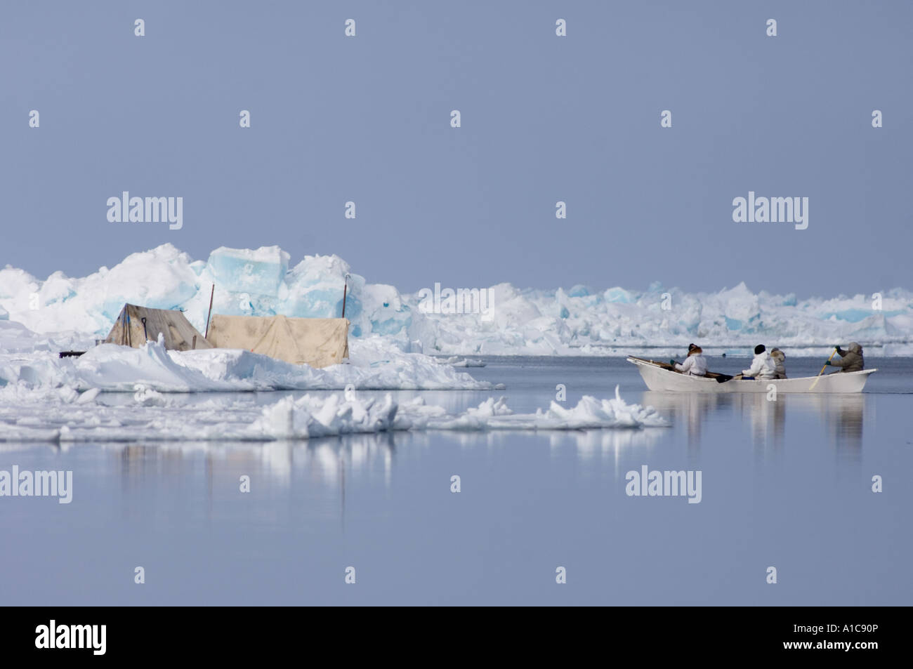 Savik whaling crew camp at the edge of an open lead on the frozen ...