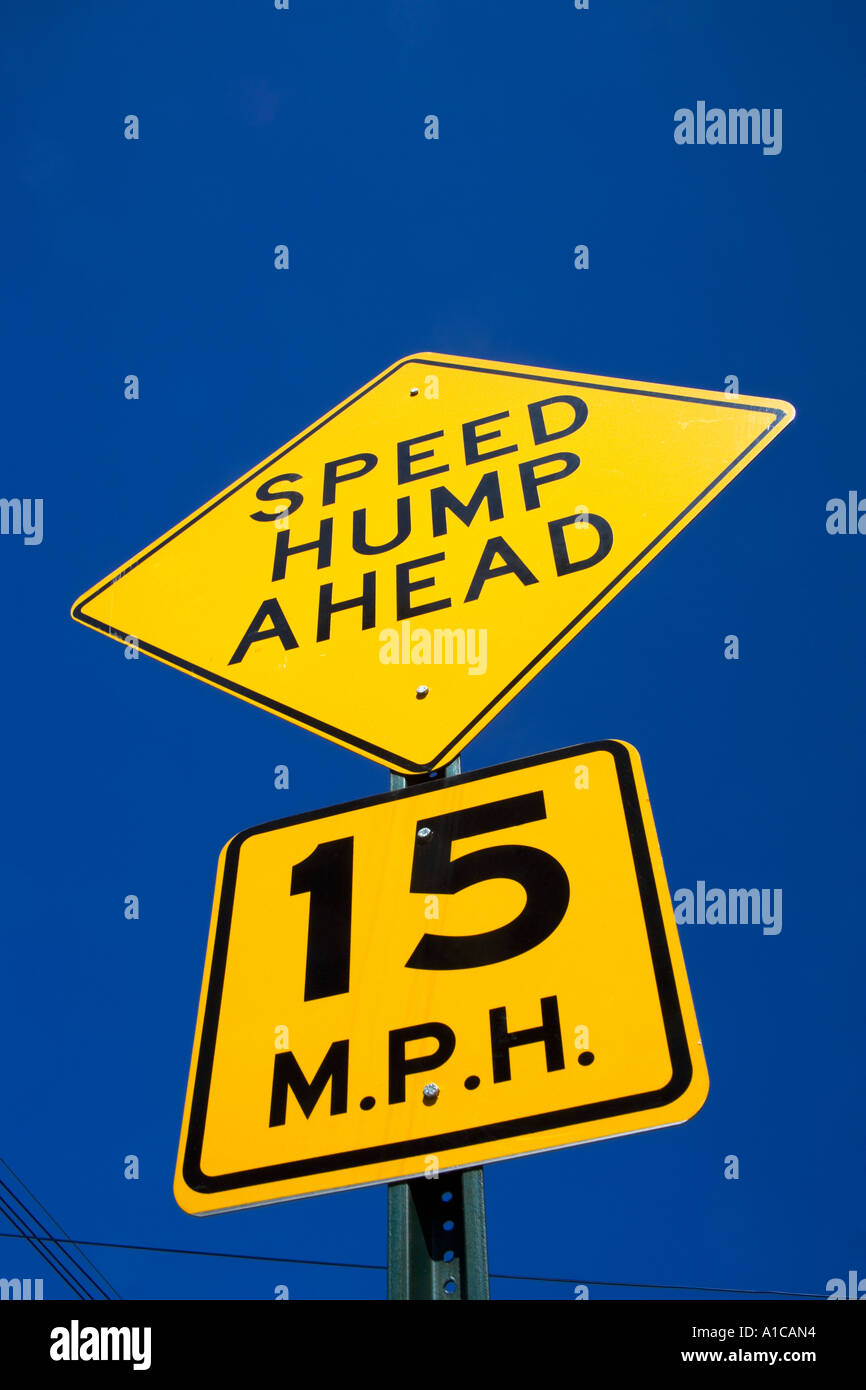 SPEED HUMP AHEAD AND MPH SIGN Stock Photo - Alamy