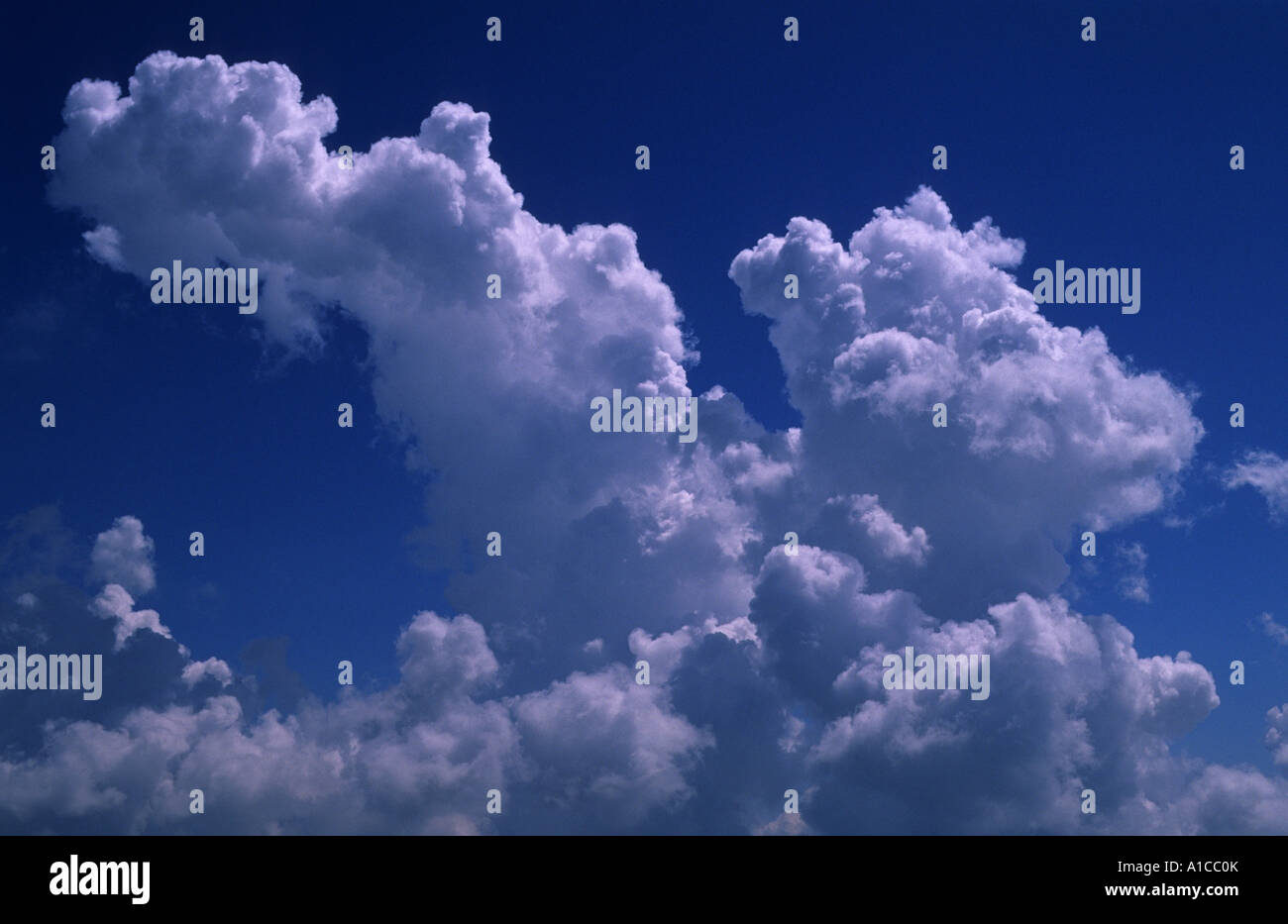 dramatic sky form white clouds formation blue sky Stock Photo - Alamy