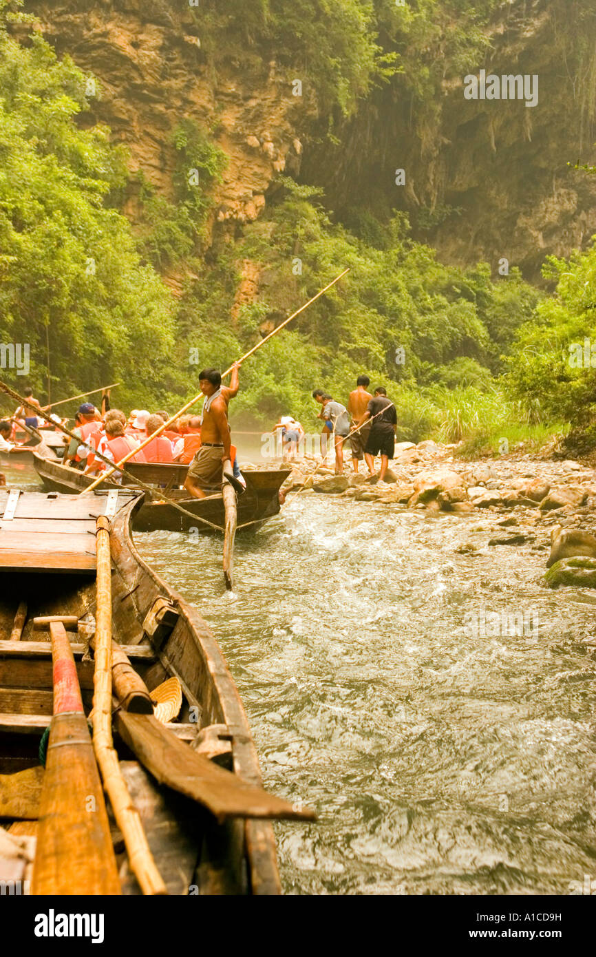 Chinese trackers pulling tourists on the Shennong Stream Stock Photo ...
