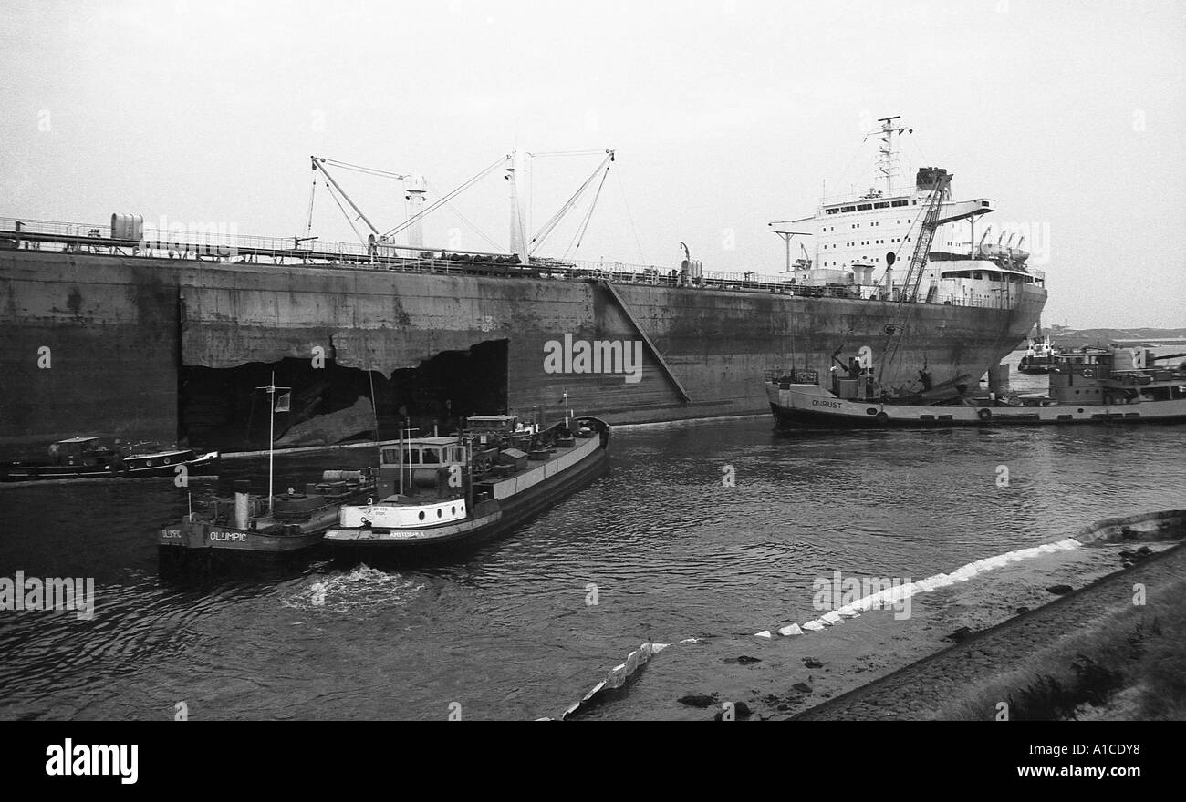 Large oil tanker with serious damage to the hull in an inlet at the sea ...