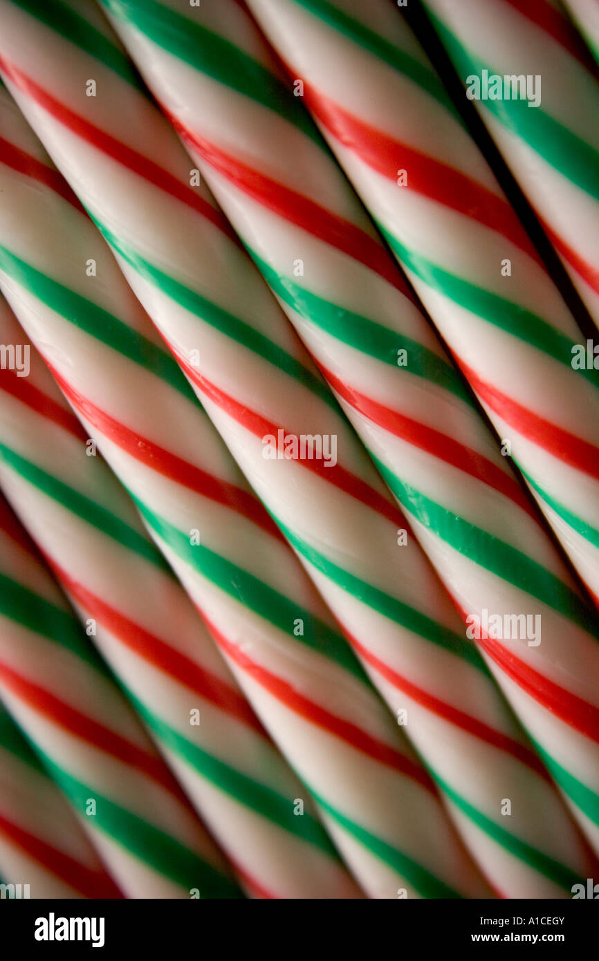 Row of candy canes for Christmas Stock Photo - Alamy