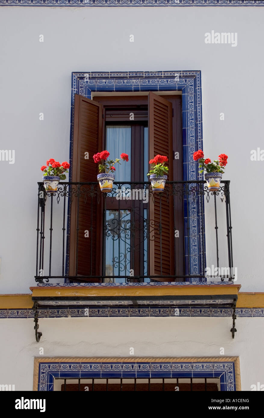 Typical traditional Spanish window in Seville Stock Photo - Alamy
