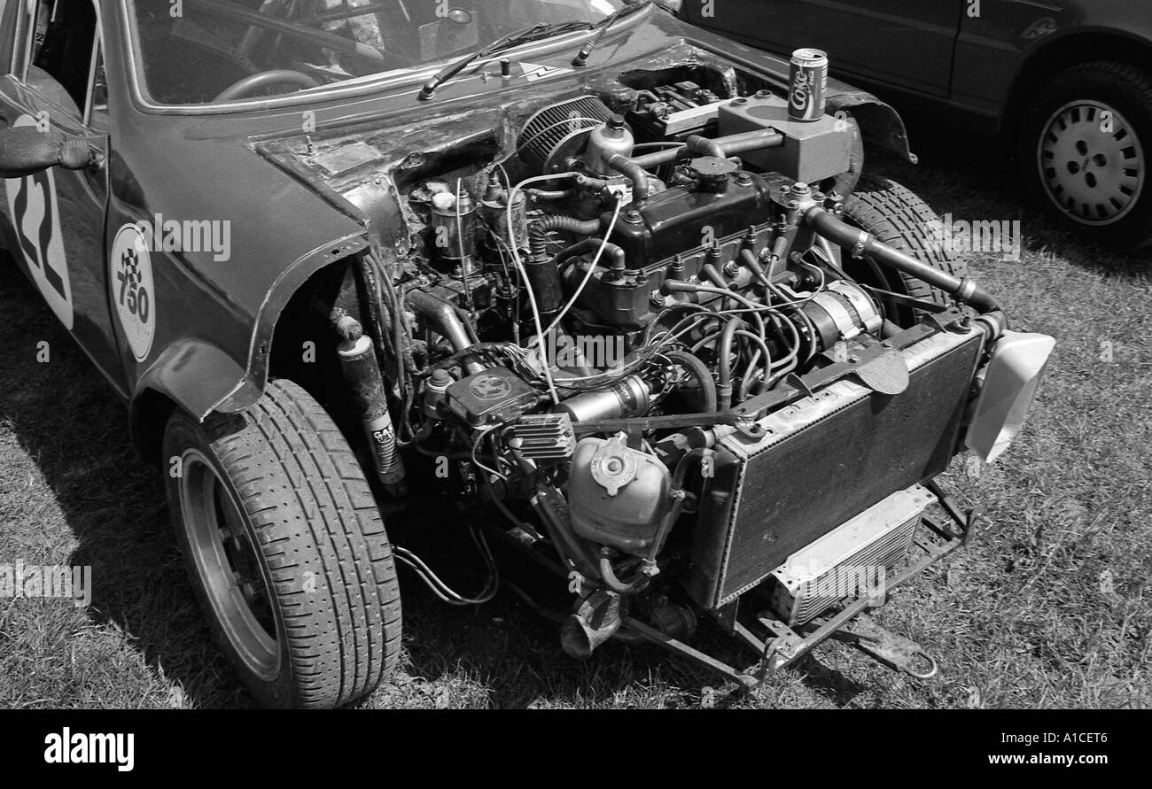 Mini racing car with front section removed showing engine and running ...