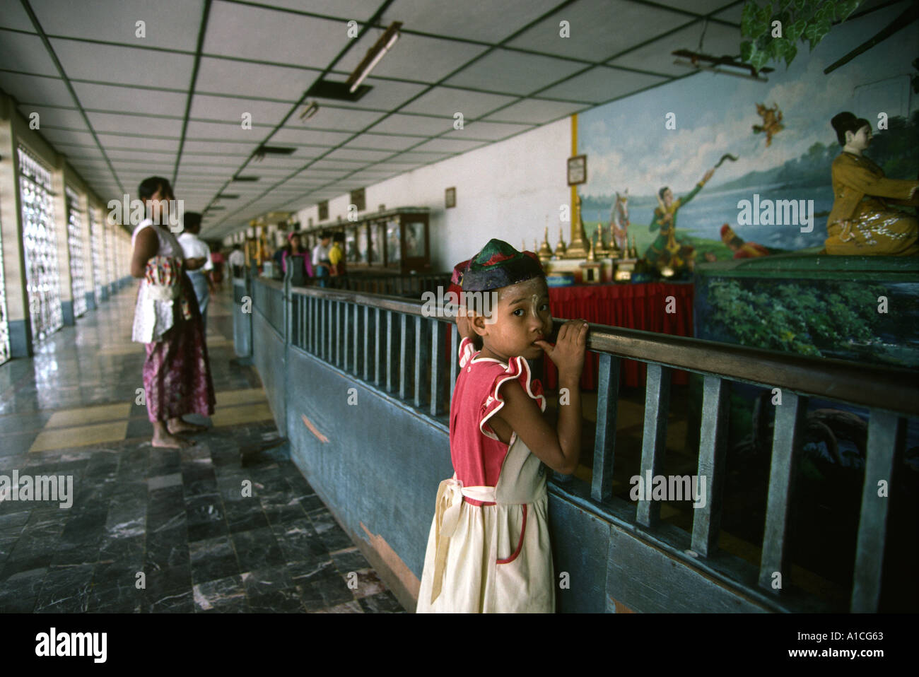 Myanmar Burma Yangon Rangoon Botataung Pagoda child inside temple Stock ...
