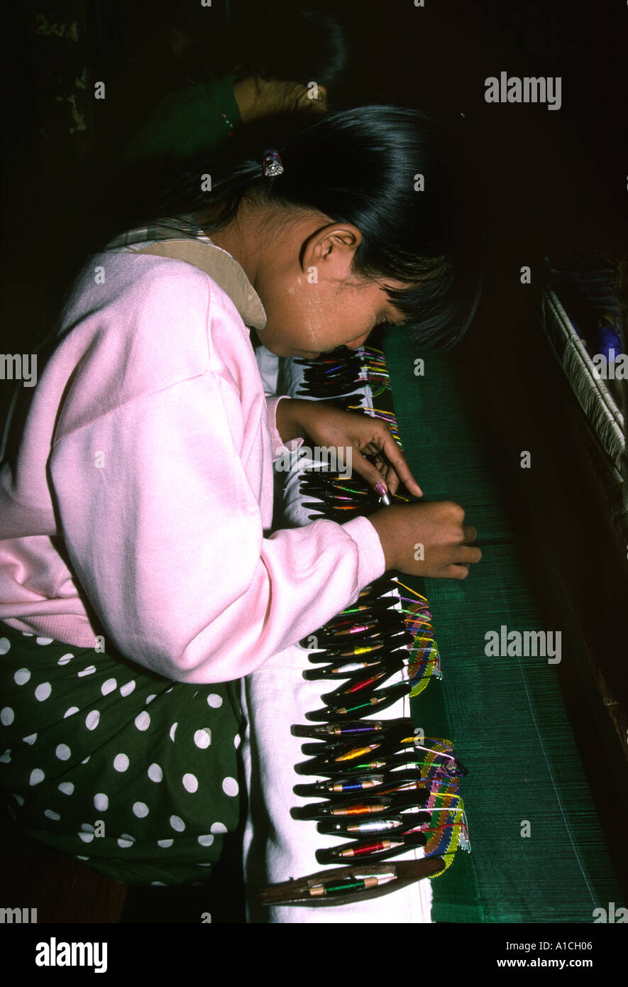 Myanmar Burma Mandalay crafts girl weaving silk at Acheik Lunyargyaw ...