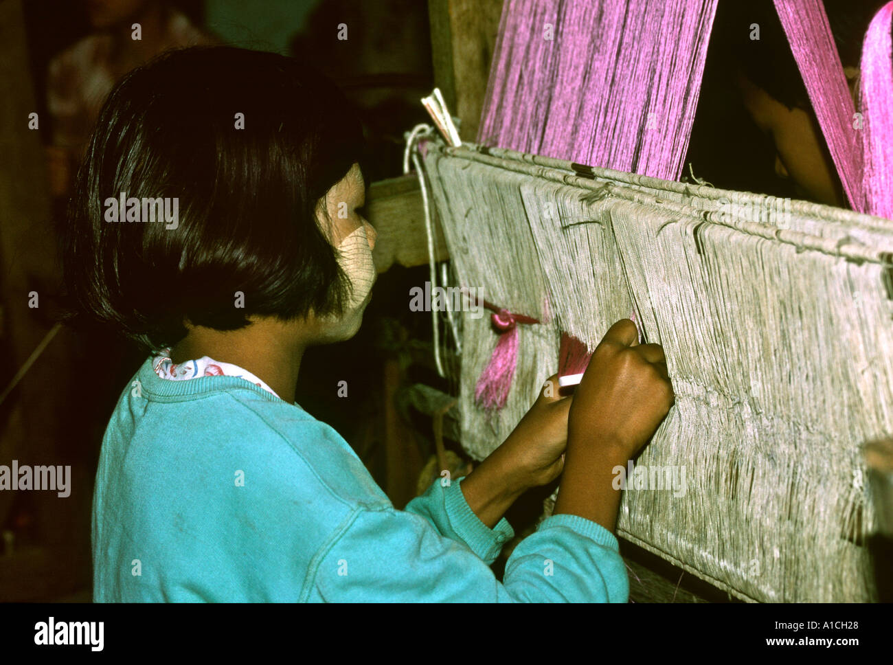 Myanmar Burma Mandalay crafts preparing silk loom at Acheik Lunyargyaw ...