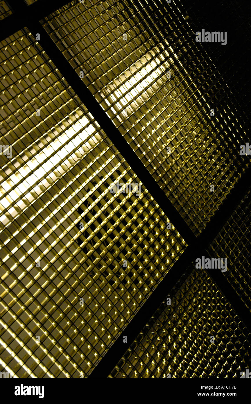 grill pattern on flourescent light in elevator Stock Photo - Alamy