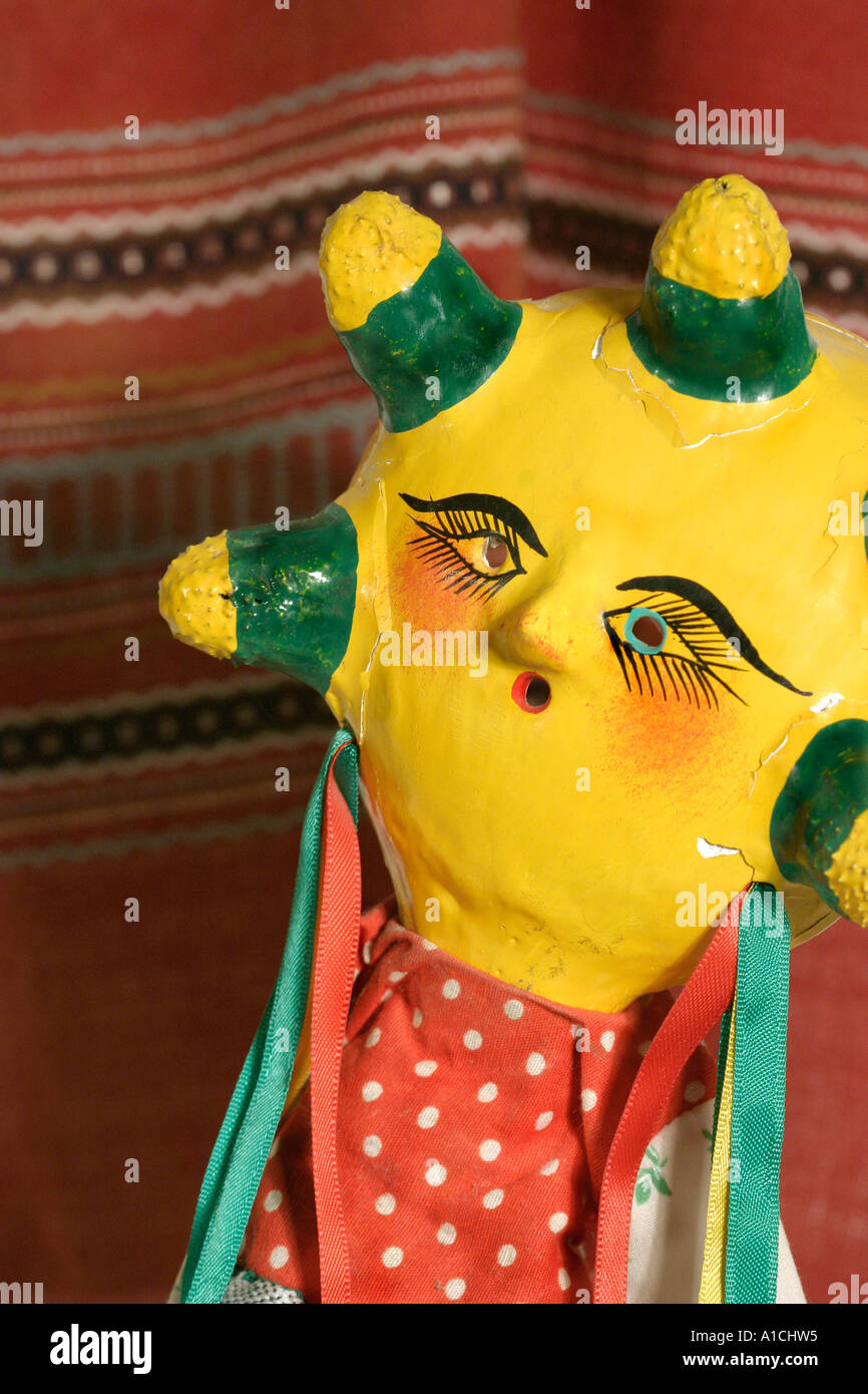 Yellow faced hand puppet Stock Photo - Alamy