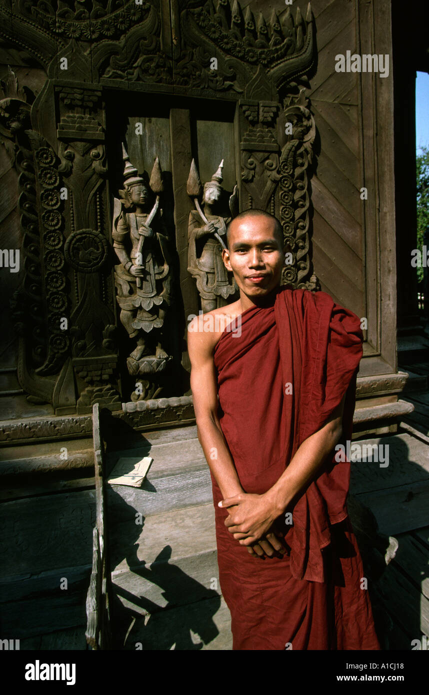 Myanmar Burma Mandalay Shwe In Bin Monastery monk in front of carved ...