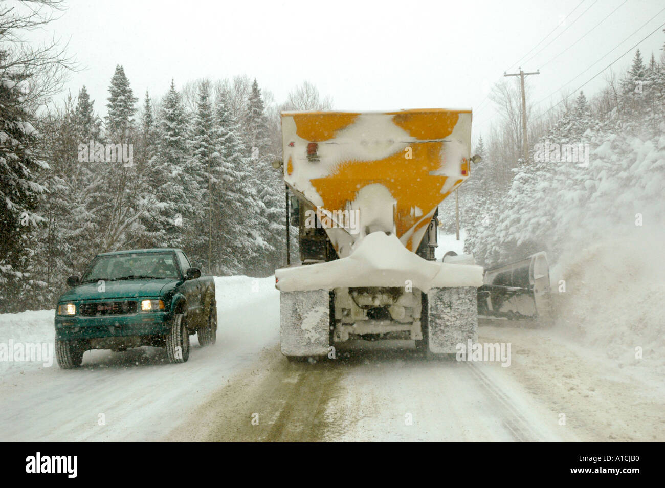 Snowplow clearing roads after heavy winter storm in the province of ...