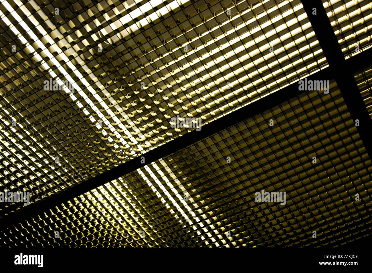 grill pattern on flourescent light in elevator Stock Photo - Alamy