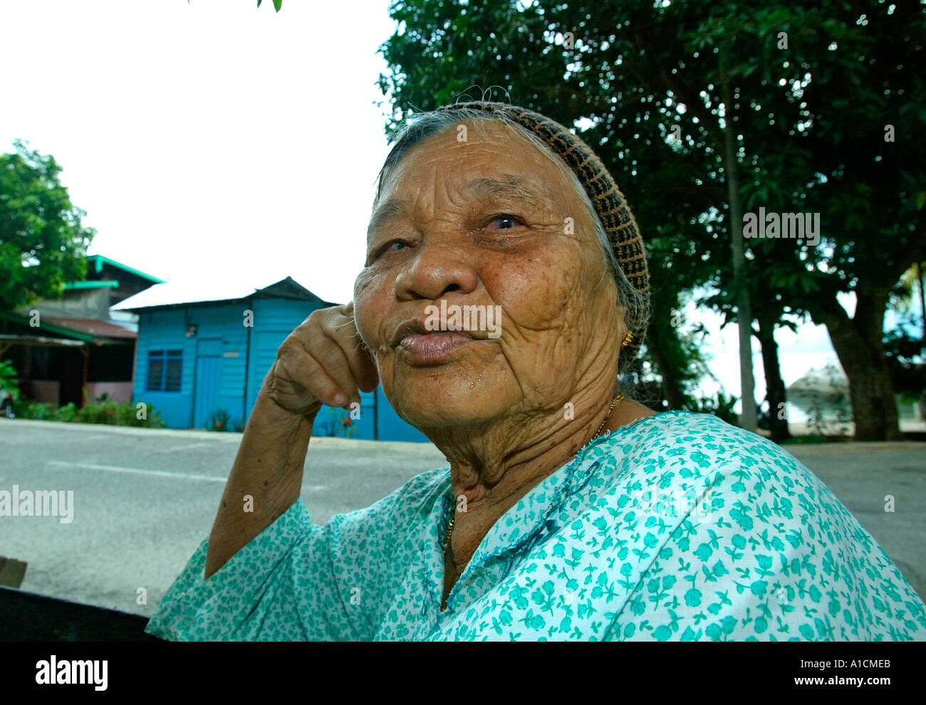 Portrait old traditional malay woman hi-res stock photography and ...
