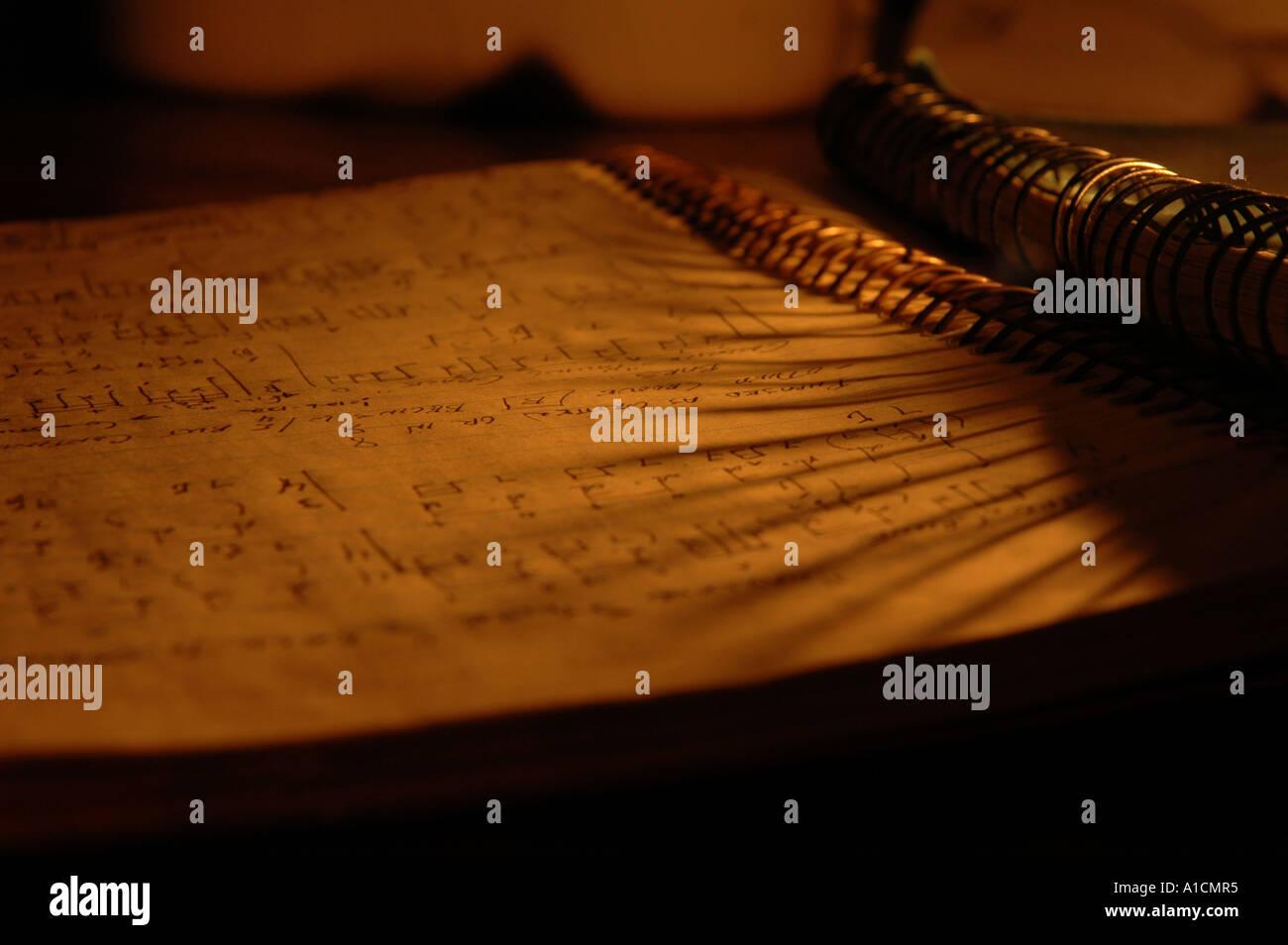 Musician's notebook by candlelight Stock Photo - Alamy