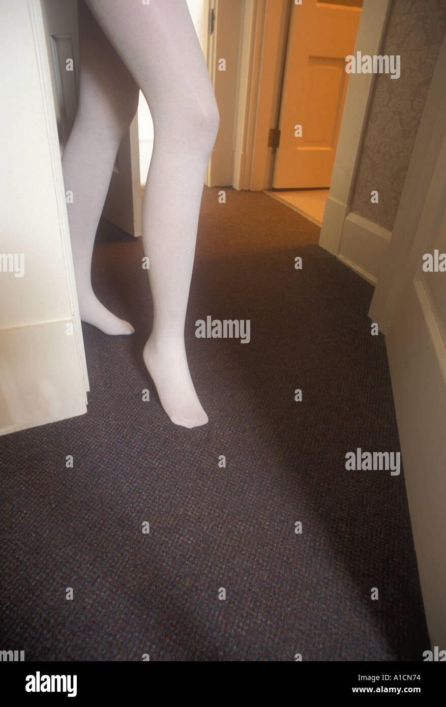 Legs Entering a Room Stock Photo - Alamy