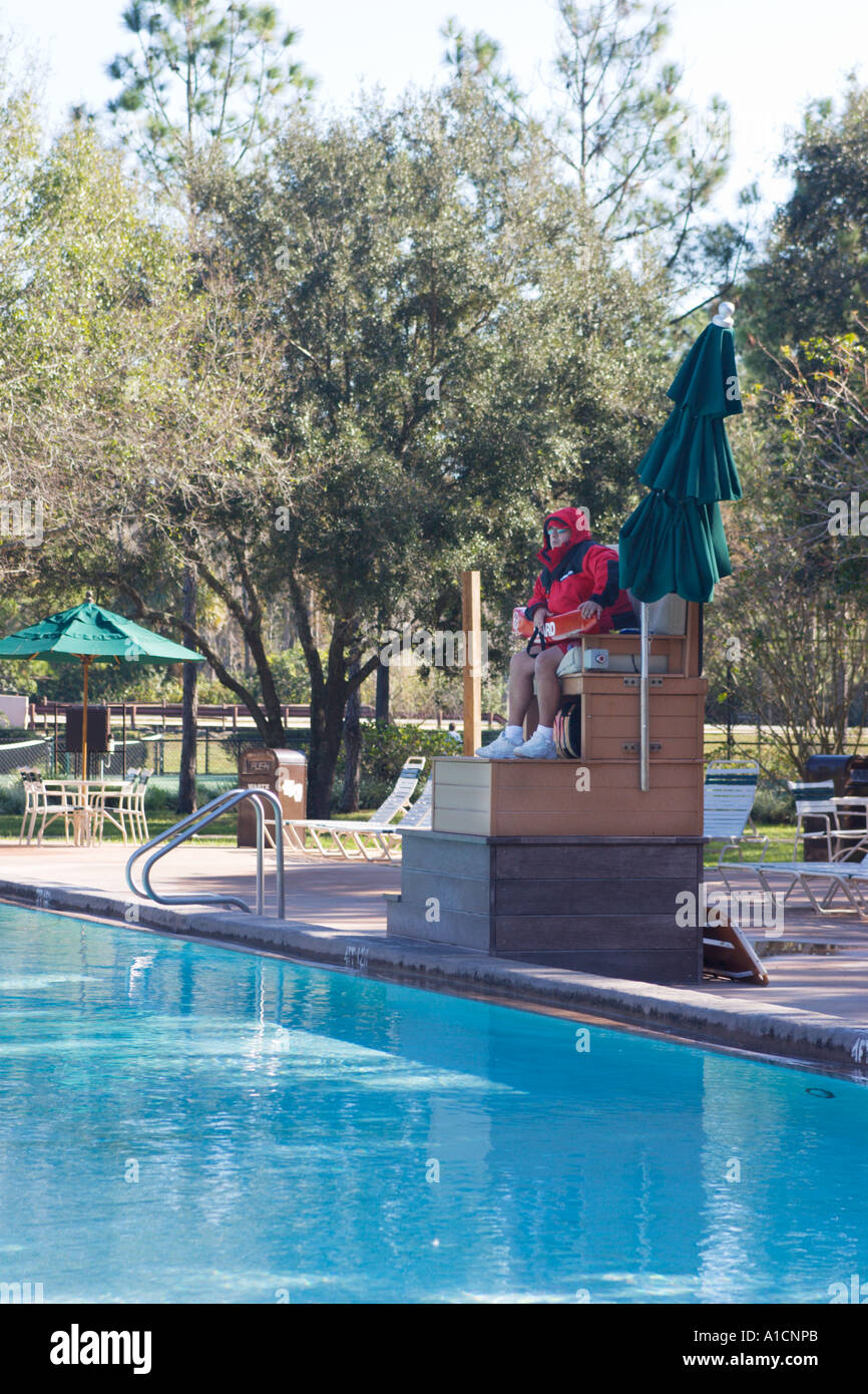 Cold lifeguard watches empty swimming pool at Ft. Wilderness Campground ...