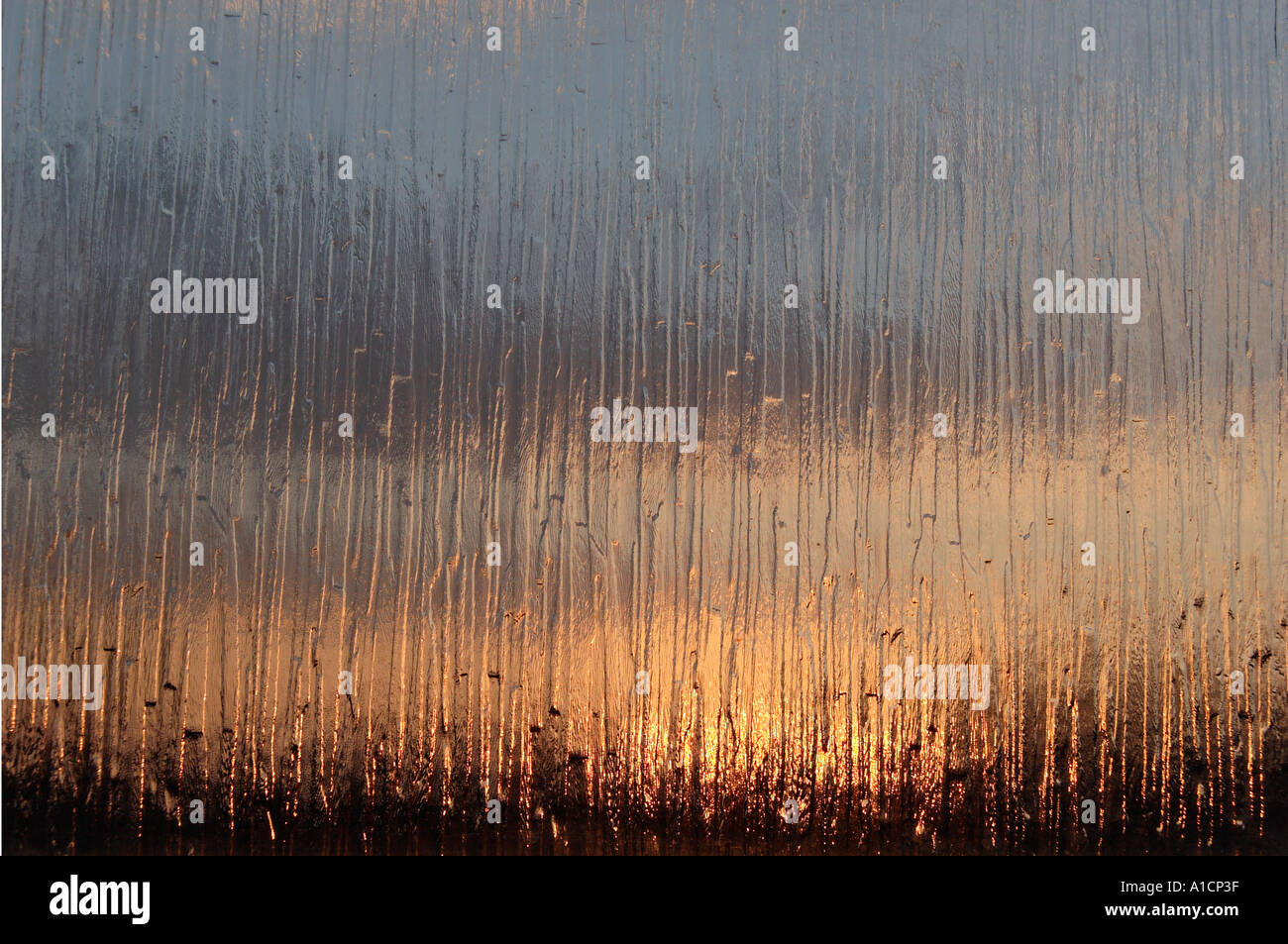 Abstract background sunset through mottled glass 6 Stock Photo - Alamy