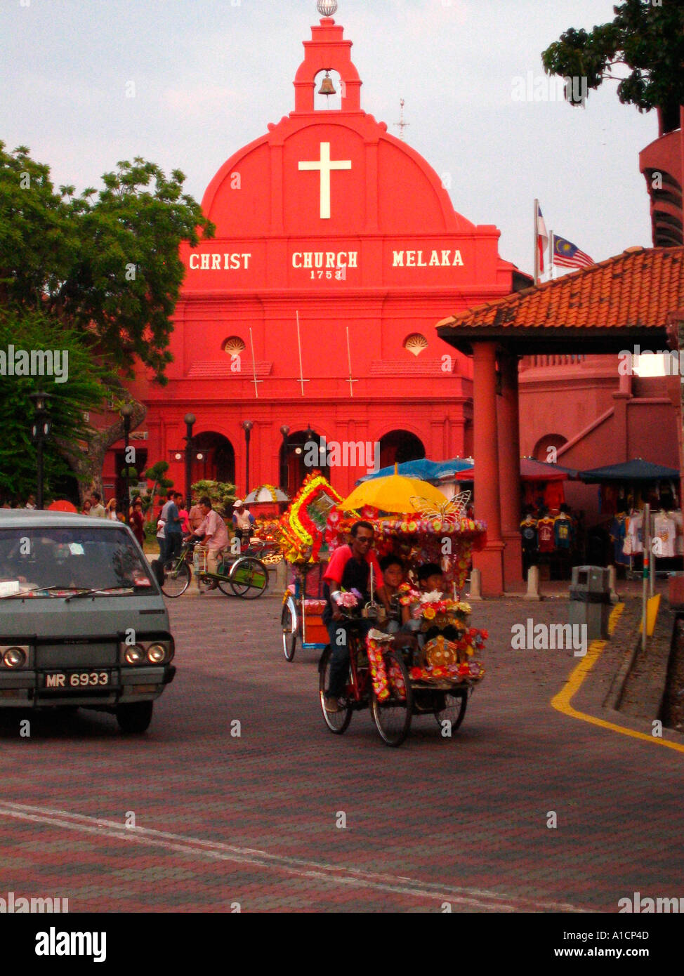 Dutch built Christ Church Malacca and tourist bicycle rickshaw Malaysia ...