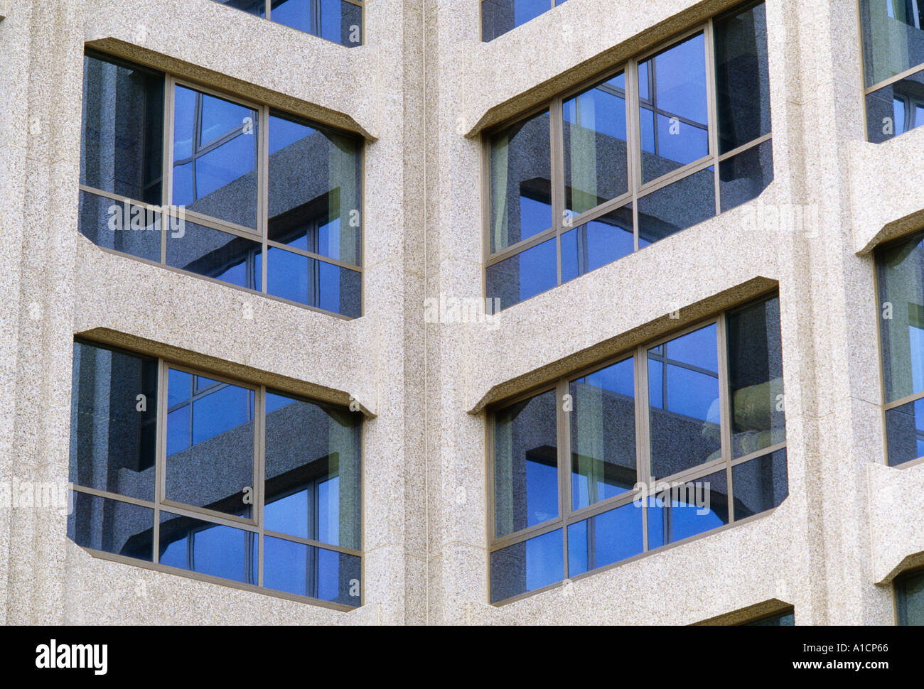 WINDOWS REFLECTIONS IN MODERN BUILDING UK Stock Photo - Alamy