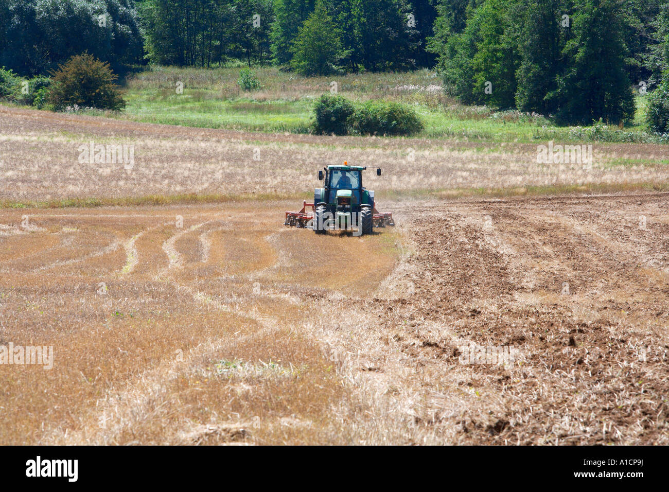 AGRICULTURE PLOWING THE FIELD Stock Photo - Alamy