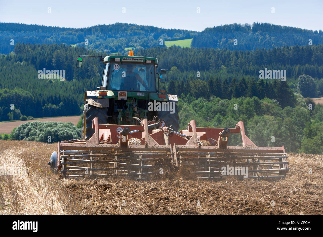 AGRICULTURE PLOWING THE FIELD Stock Photo - Alamy