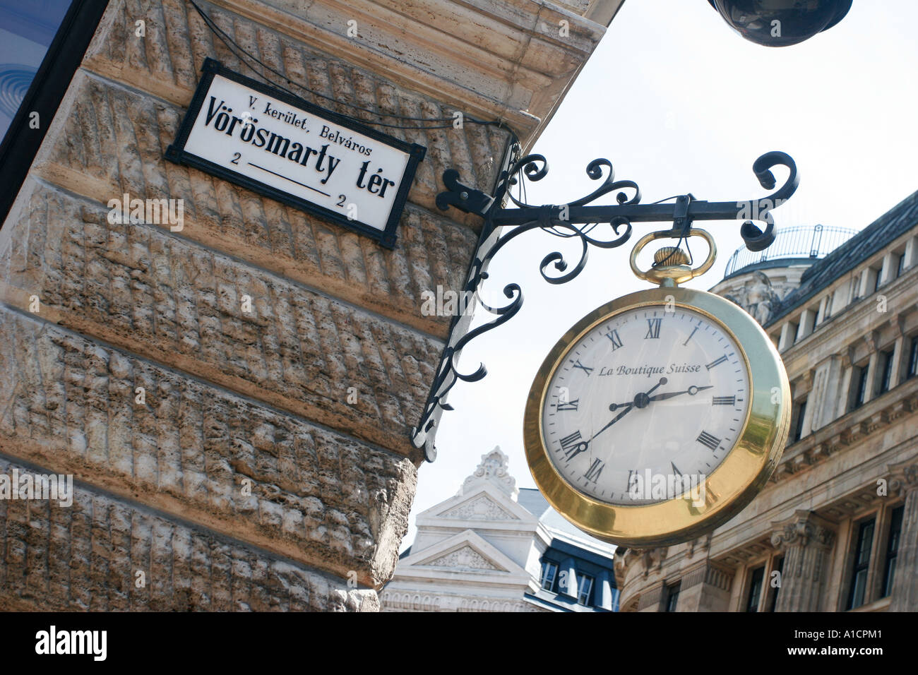 Clock on street budapest hungary hi-res stock photography and images ...