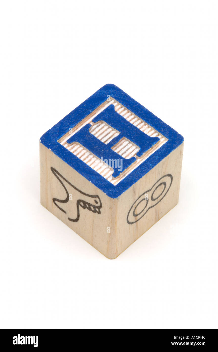 Children wooden learning block showing blue alphabet H Stock Photo - Alamy