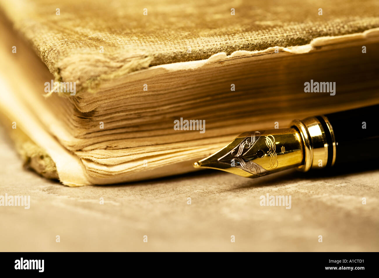 Fountain pen and old book Stock Photo - Alamy