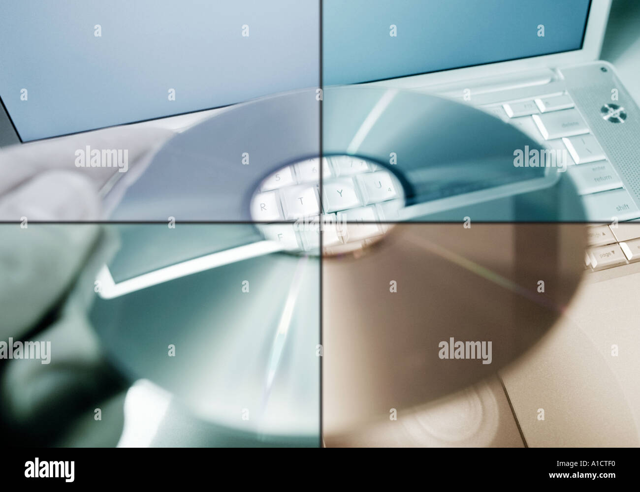 Hand holding CD above laptop computer Stock Photo - Alamy