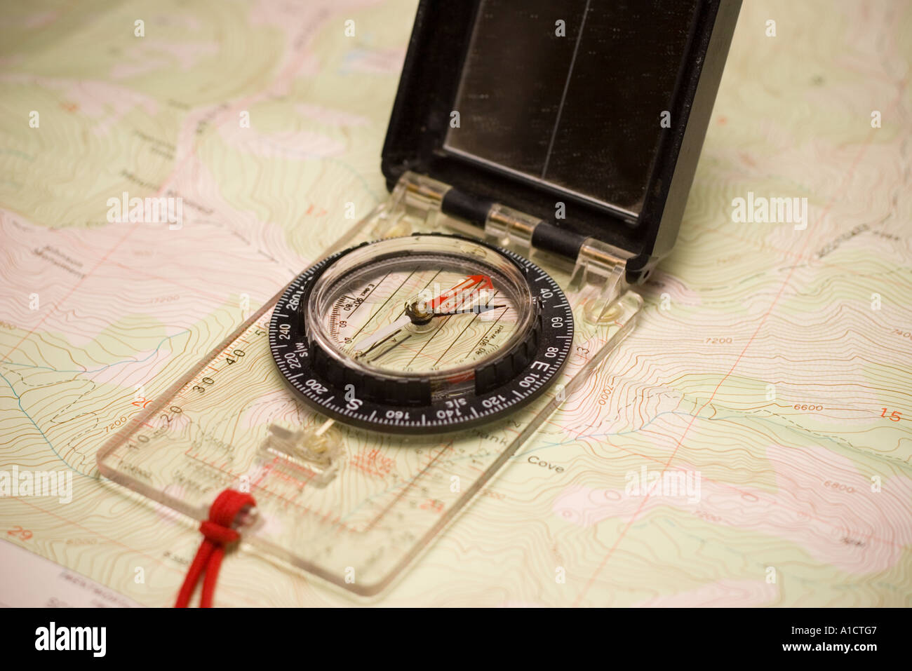 A compass and USGS topographic map Stock Photo - Alamy