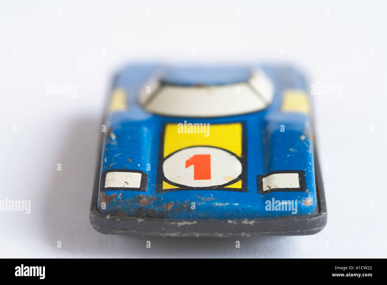 small metal toy racing car in blue and yellow with number one Stock ...