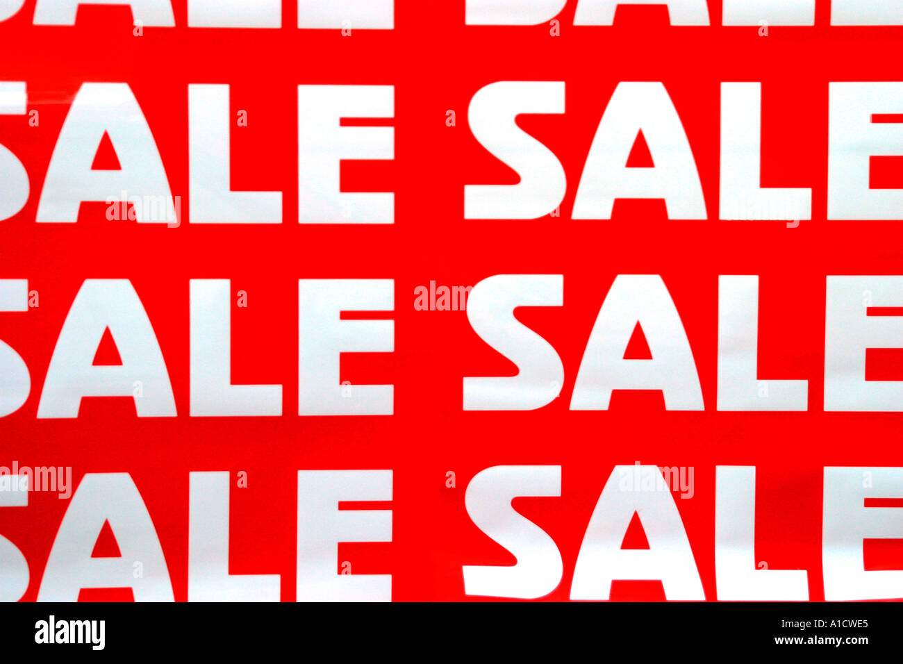 Shop window poster advertising sale Stock Photo - Alamy