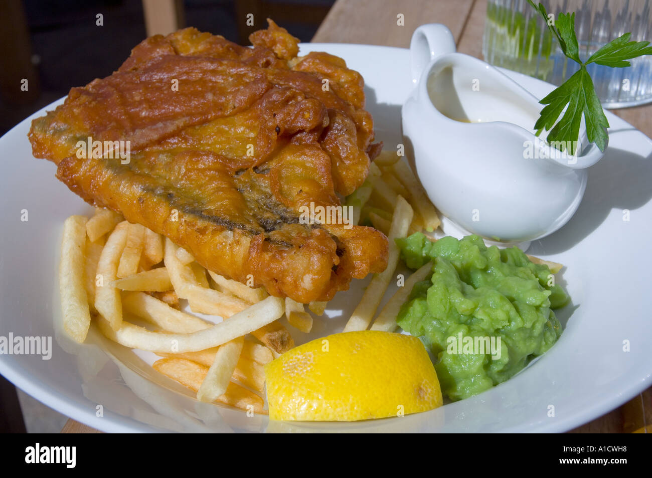 gourmet fish and chips with mushy peas Stock Photo - Alamy