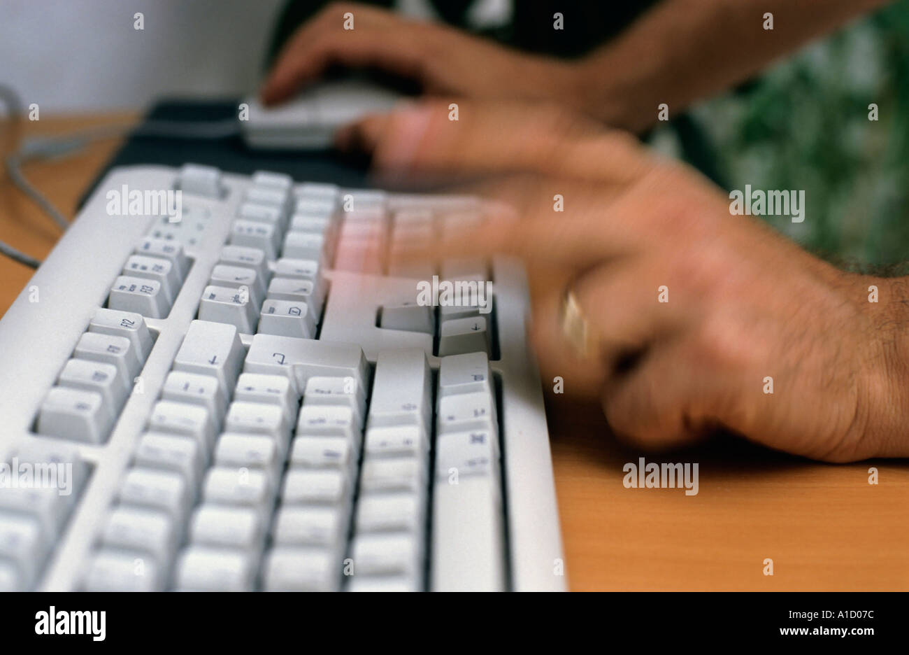 Man S Hand Manipulating A Computer Keyboard Stock Photo - Alamy