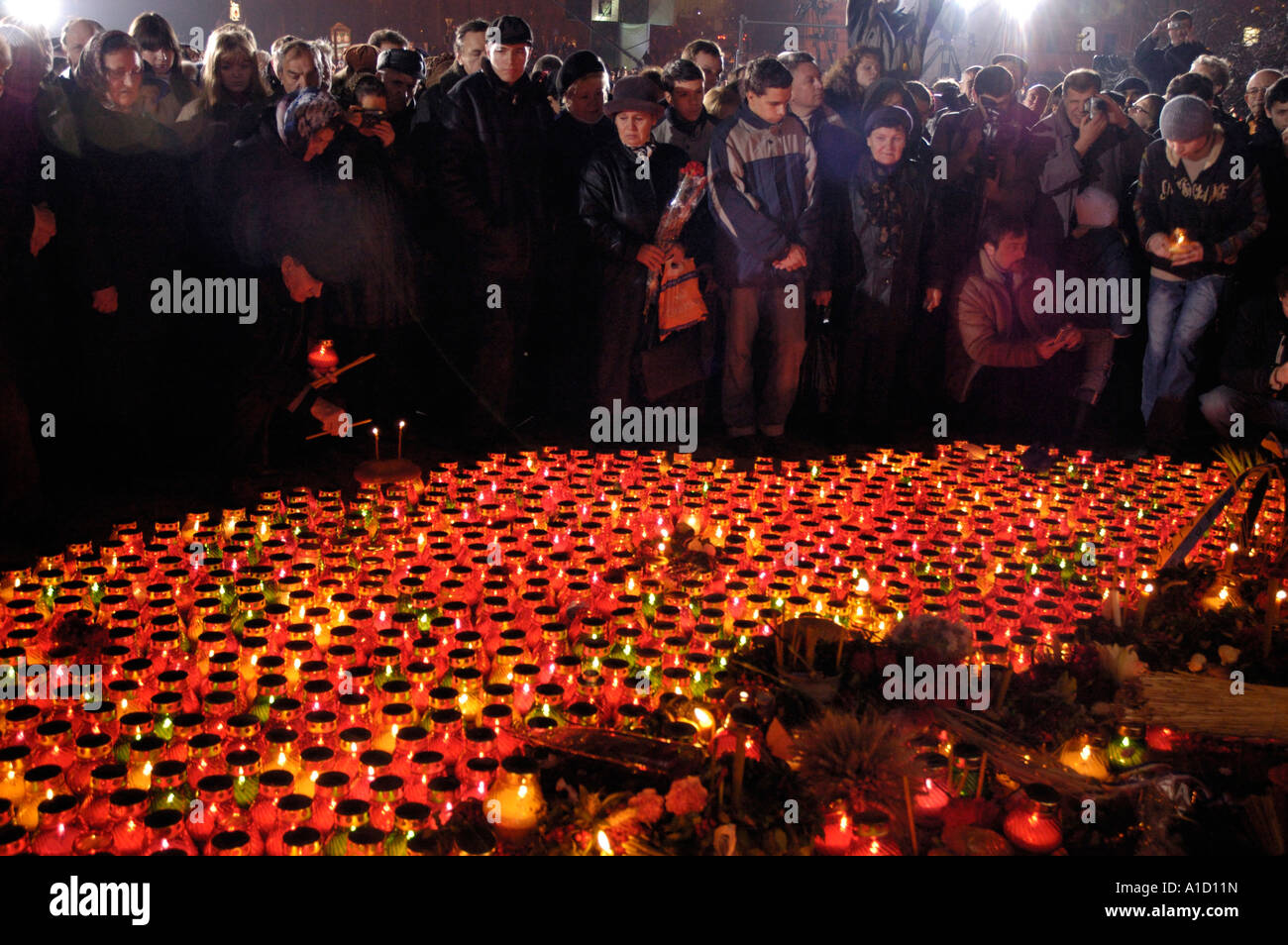 People lighting candles Stock Photo - Alamy