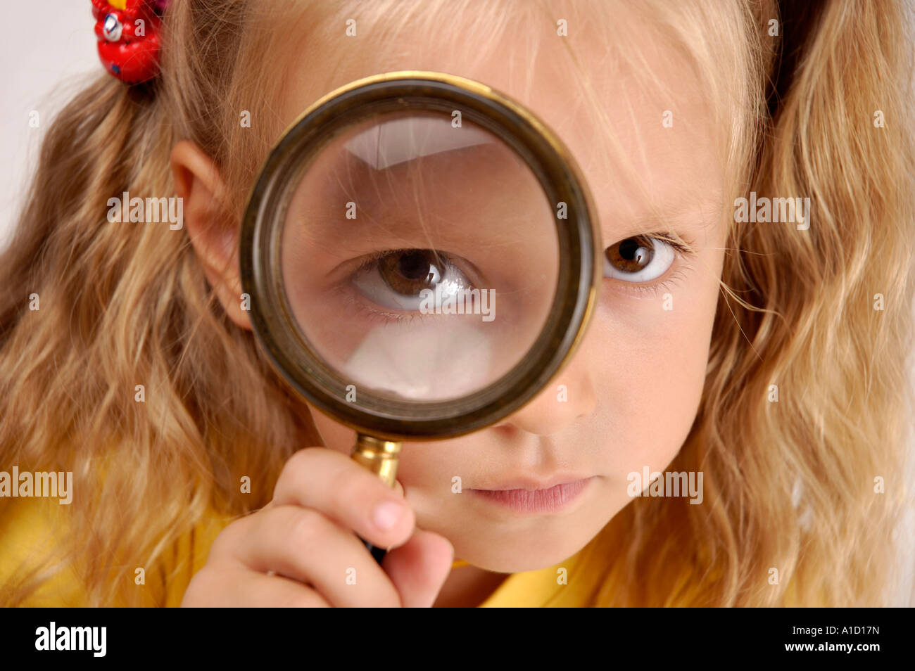 Magnified child hi-res stock photography and images - Alamy
