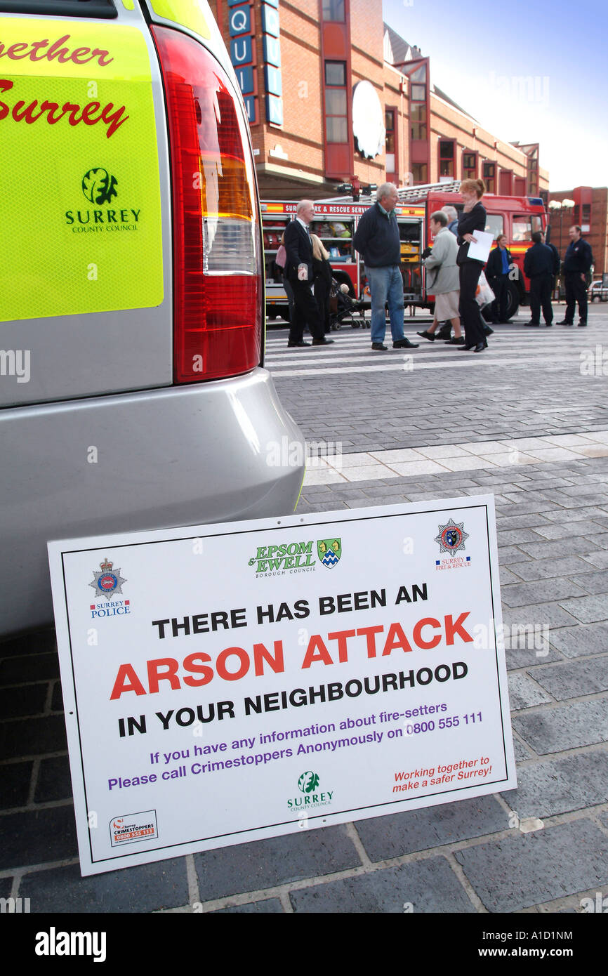 Sign warning community of arson attack Stock Photo - Alamy