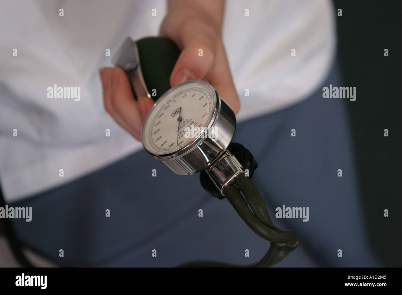 Blood pressure pump arm hi-res stock photography and images - Alamy