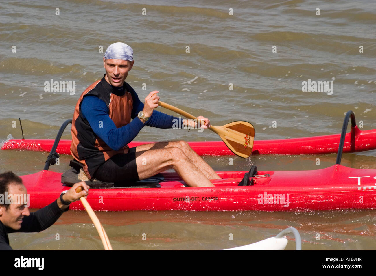 Man on outrigger canoe in Somme estuary St Valery sur Somme French ...