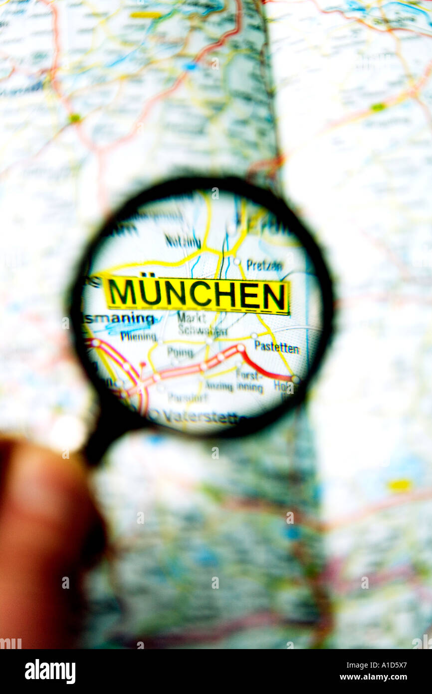 Map of munchen under magnifying glass hi-res stock photography and ...