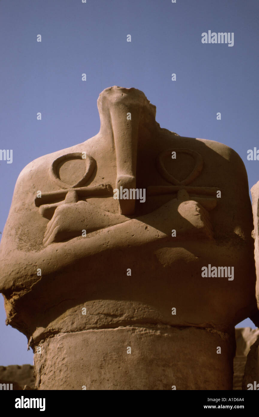 Statue in Karnak Temple holding the Ankh, the key of life, Luxor, Egypt ...